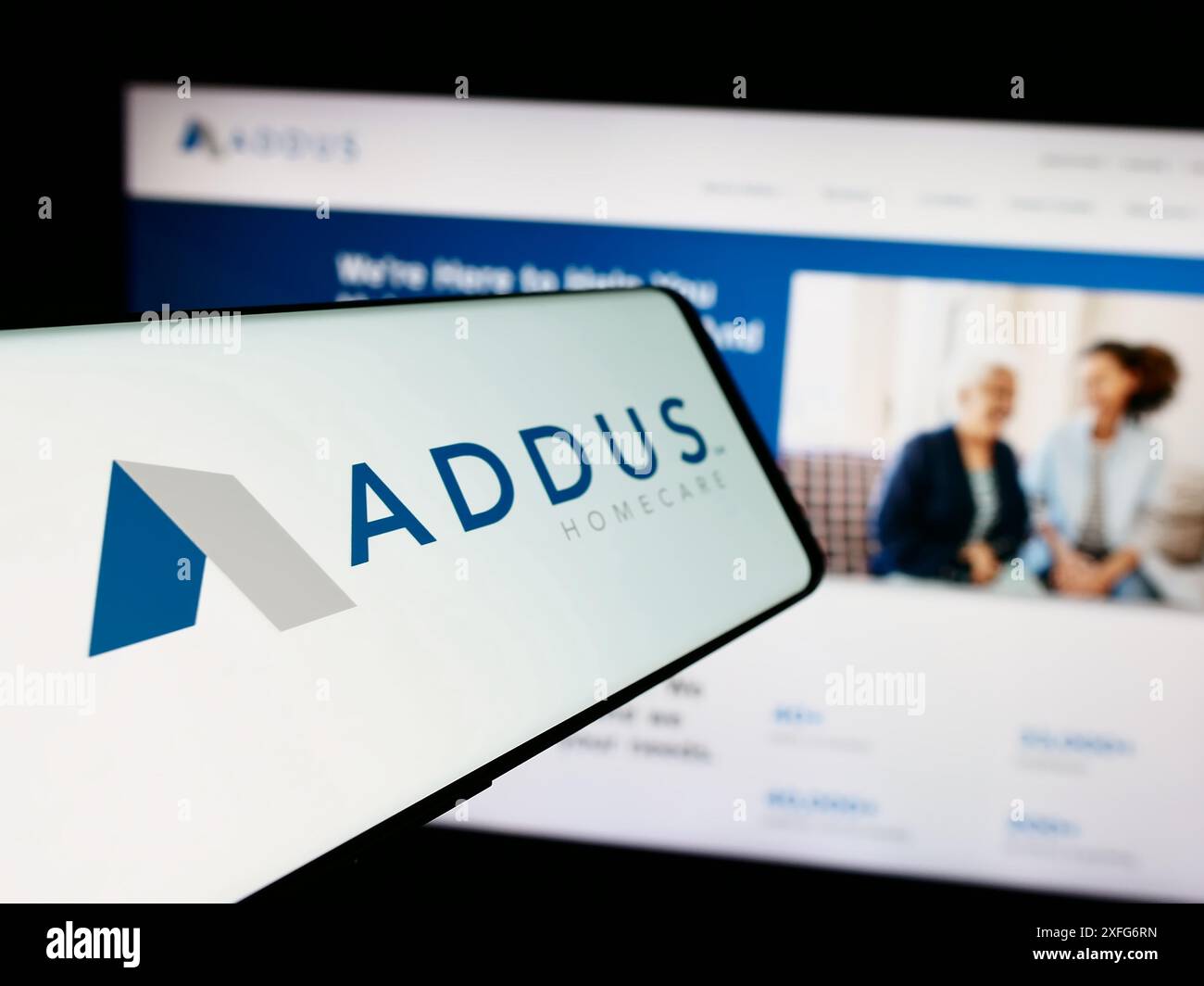 Mobile phone with logo of American home care company Addus HomeCare ...