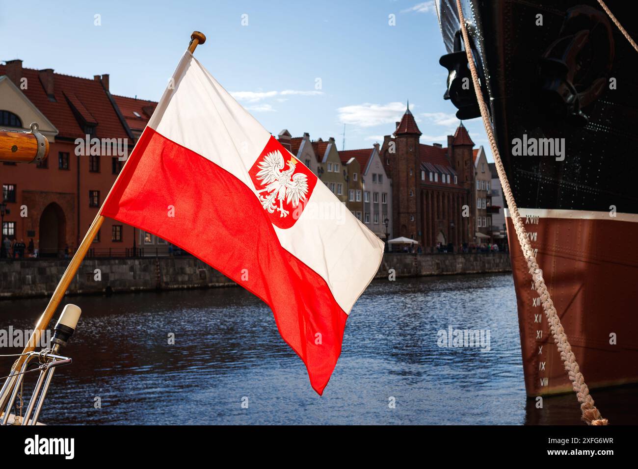 Polish flag with national coat of arms used as a naval ensign of Poland ...