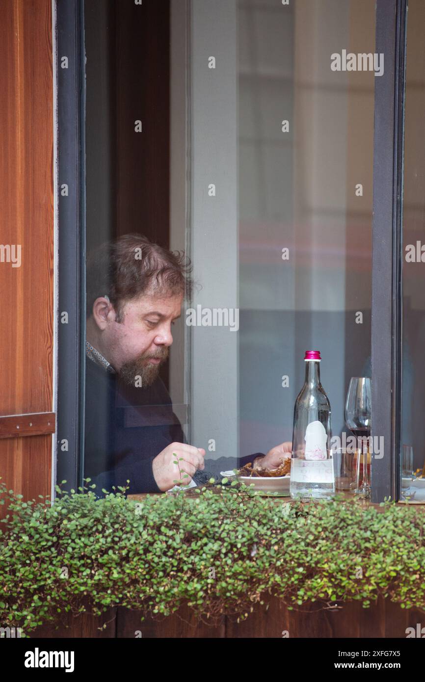 lonely man at the restaurant Stock Photo - Alamy