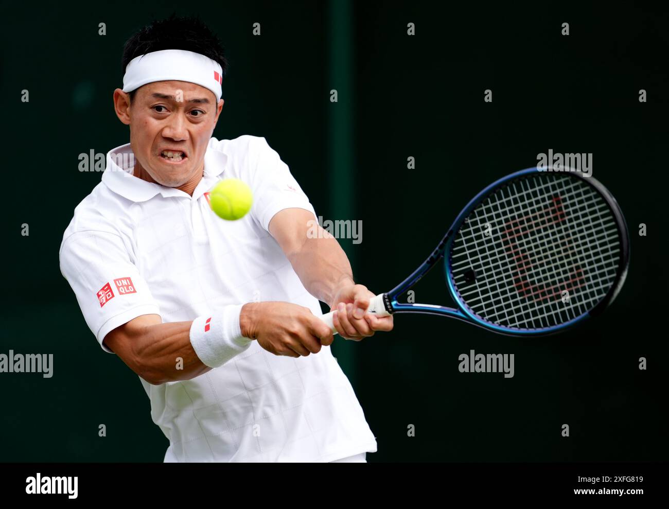 Kei Nishikori in action against Arthur Rinderknech on day three of the ...