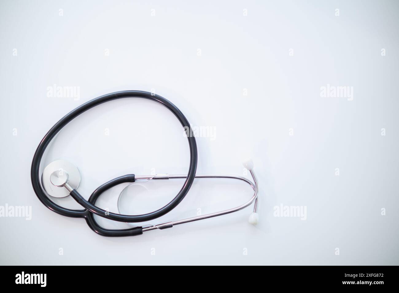 Doctors use stethoscope to listen patient heartbeat to find faults in ...