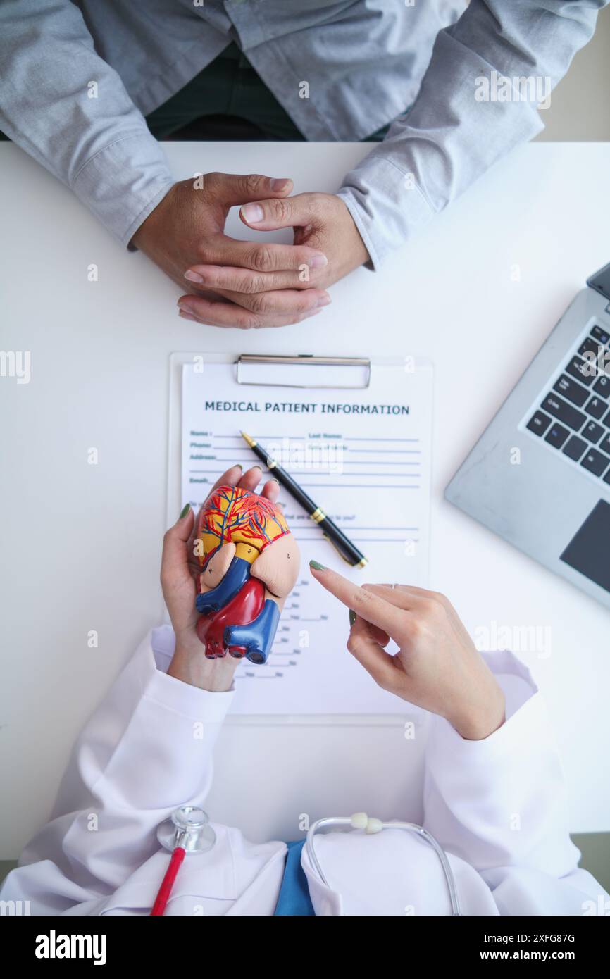 realistic looking heart model in hands of doctor is symbol of campaign ...