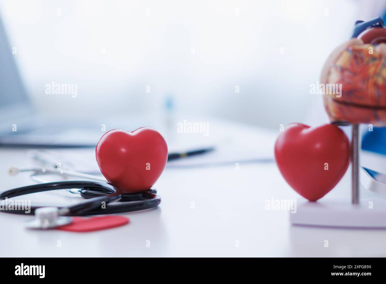 Doctors use stethoscope to listen patient heartbeat to find faults in ...