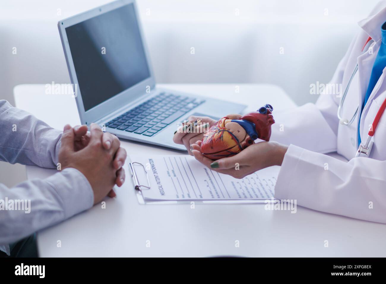 realistic looking heart model in hands of doctor is symbol of campaign ...