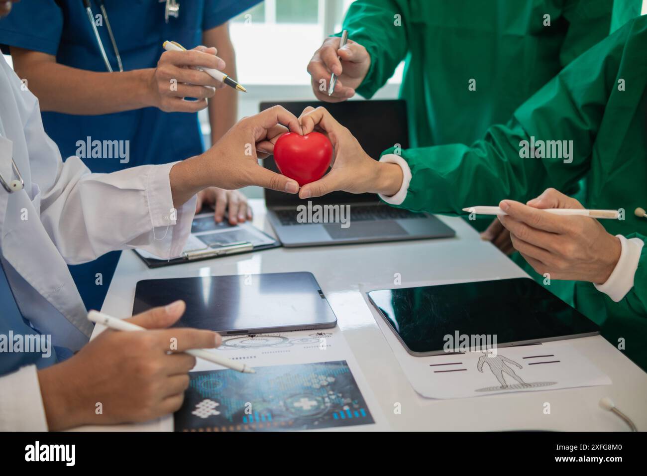 The red heart symbol in the doctor's hand is a symbol of the campaign ...