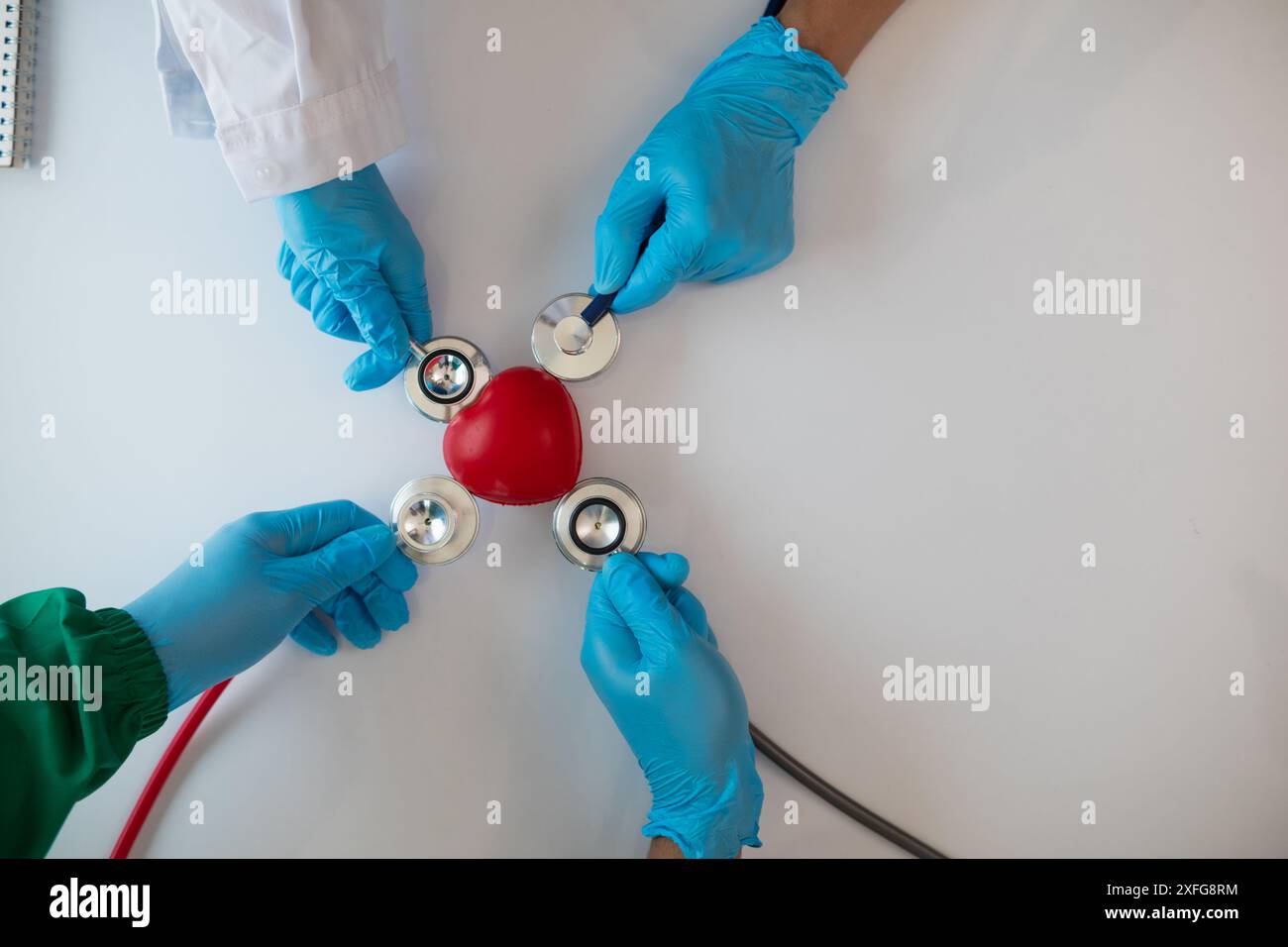 Doctors use stethoscope to listen patient heartbeat to find faults in ...