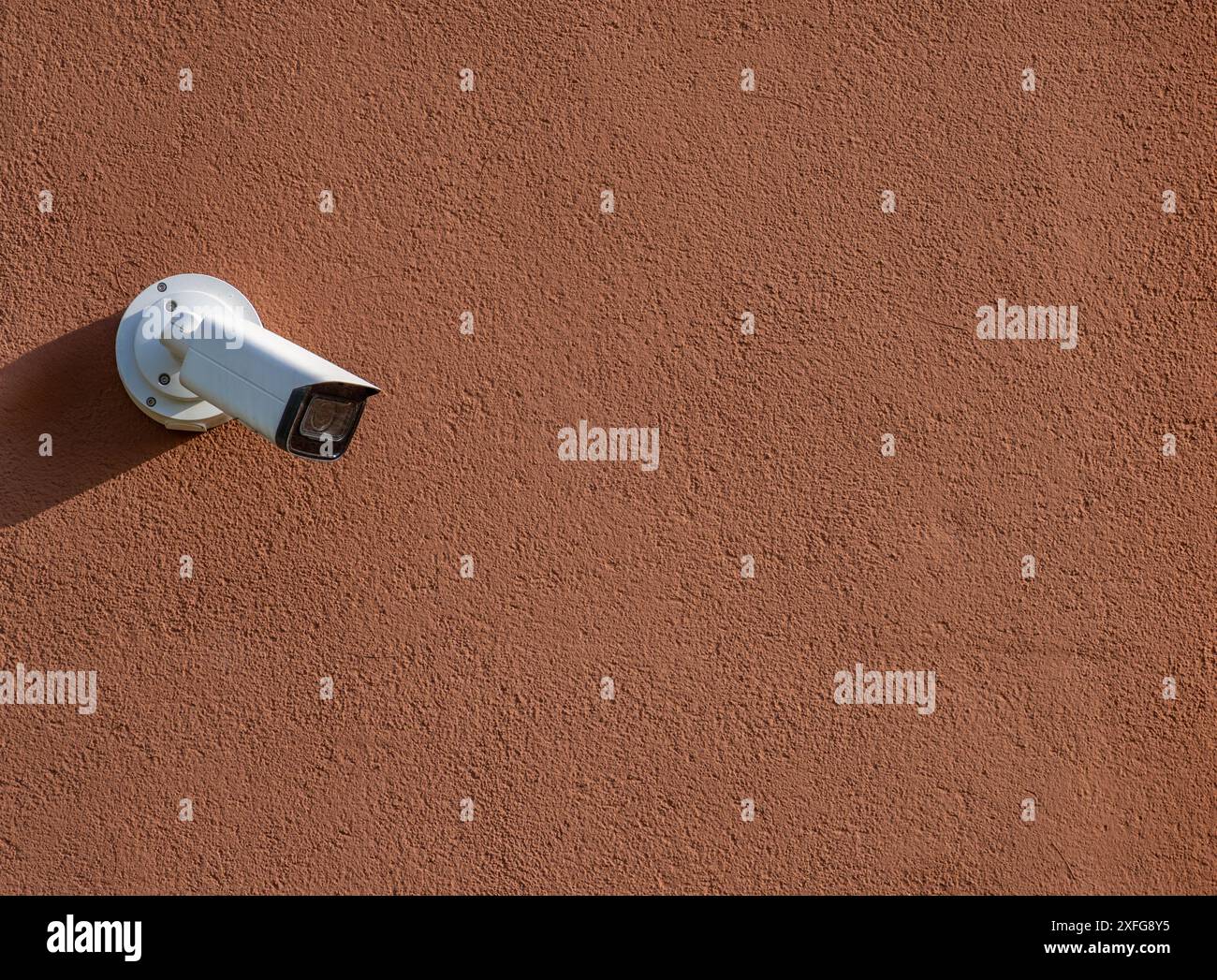 Camera hanging on the wall for video surveillance Stock Photo - Alamy