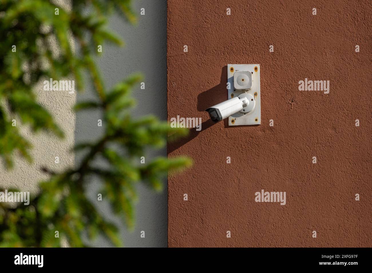 Camera hanging on the wall for video surveillance Stock Photo - Alamy