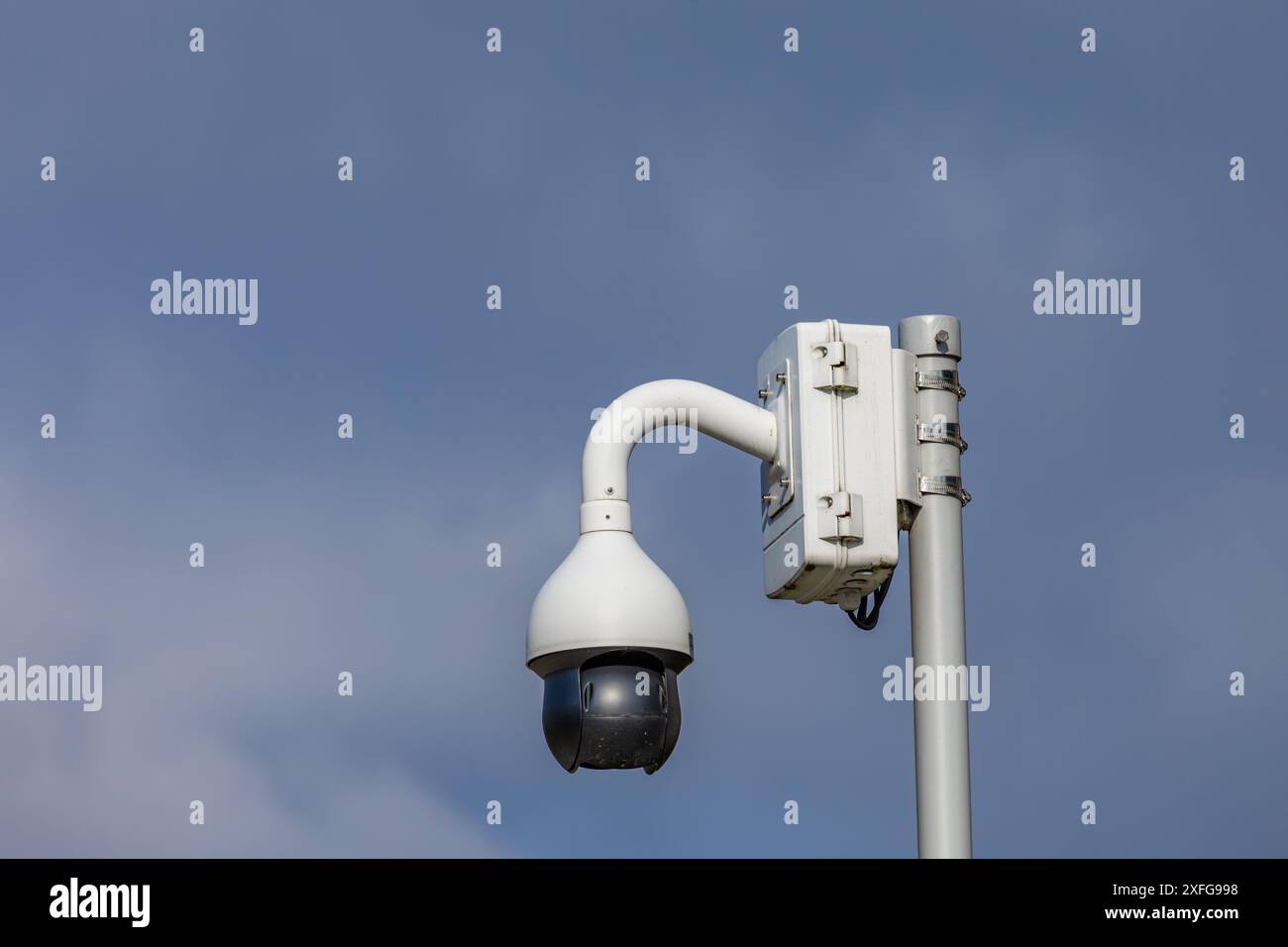 Camera hanging on the wall for video surveillance Stock Photo - Alamy
