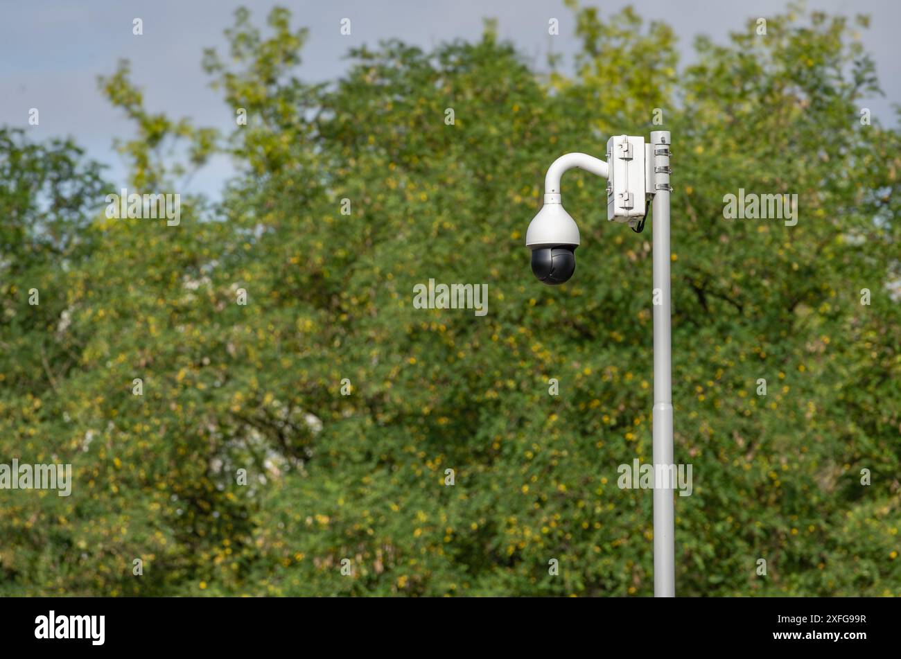 Camera hanging on the wall for video surveillance Stock Photo - Alamy