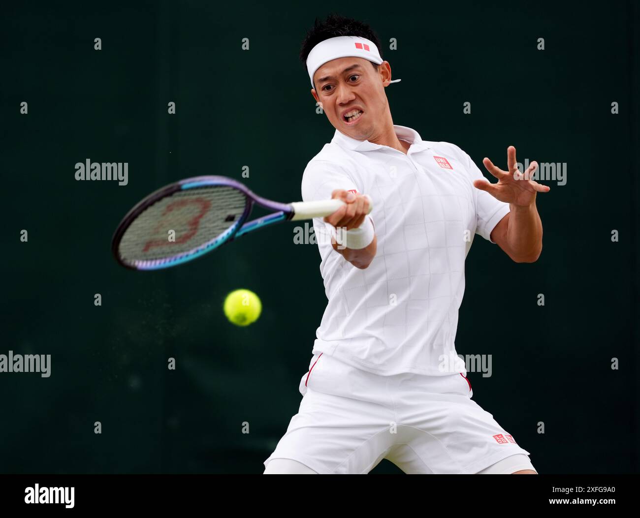 Kei Nishikori during his match against Arthur Rinderknech on day three ...