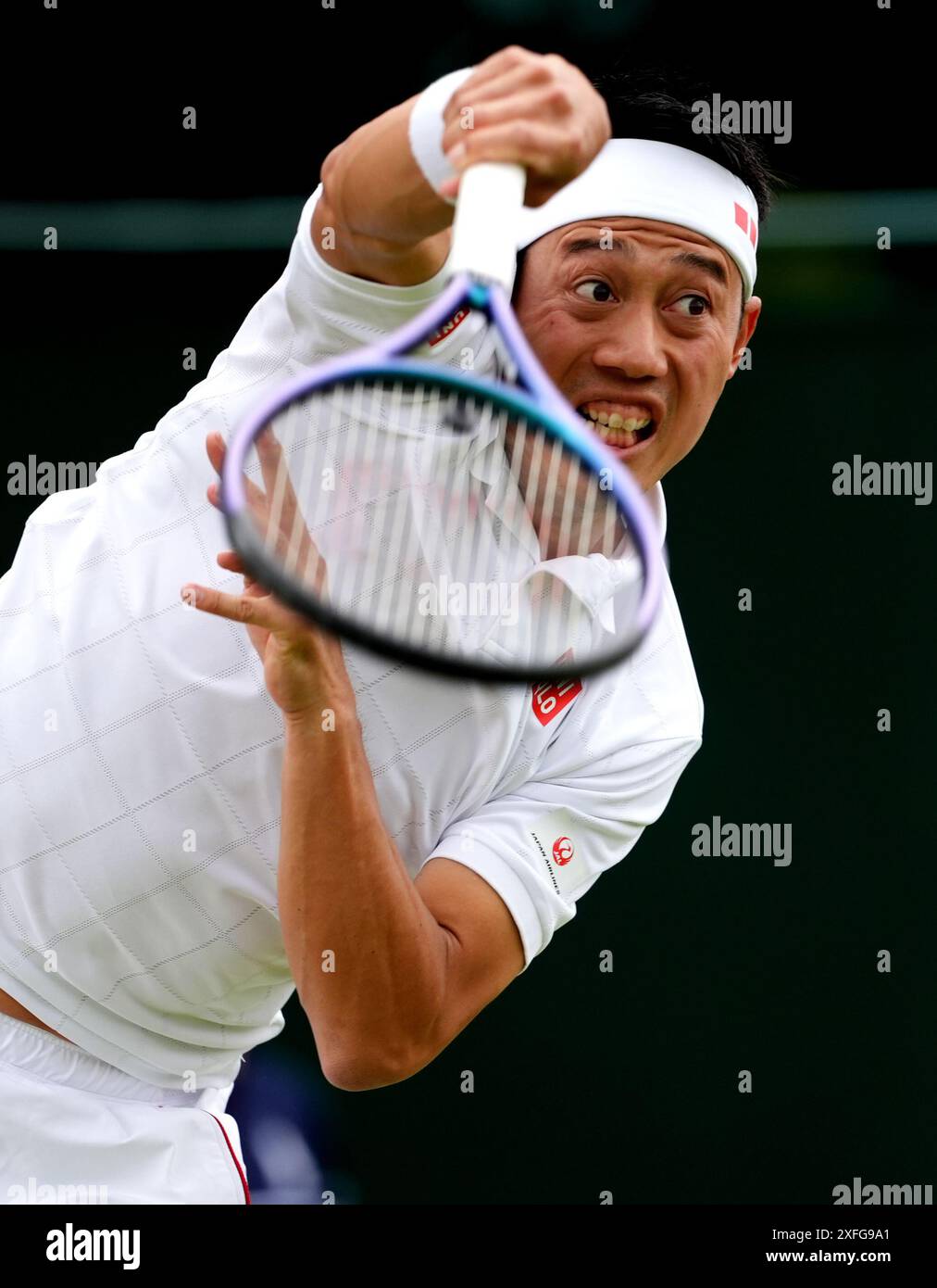 Kei Nishikori during his match against Arthur Rinderknech on day three ...