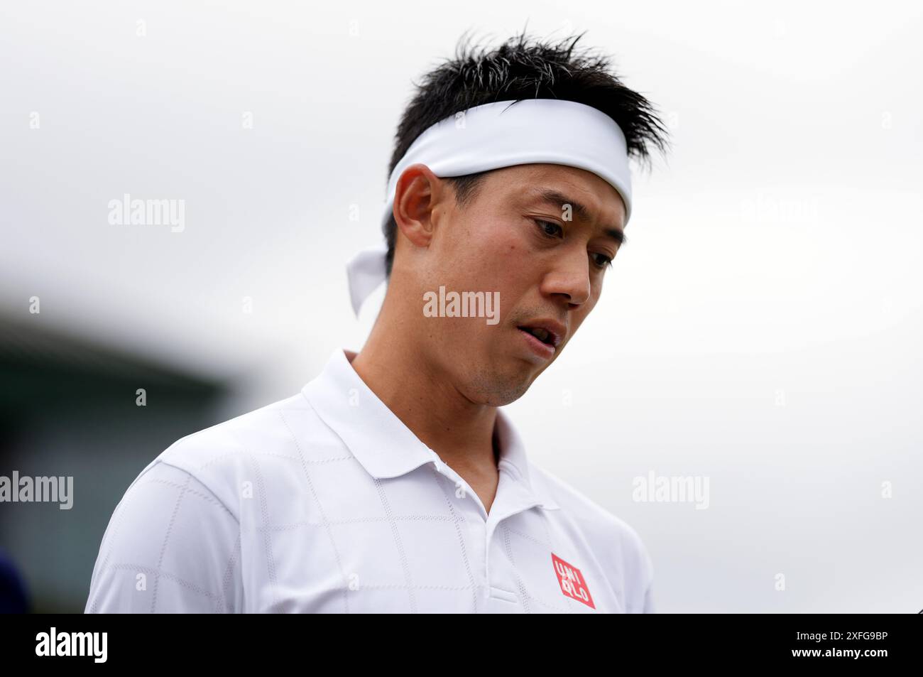 Kei Nishikori during his match against Arthur Rinderknech on day three ...