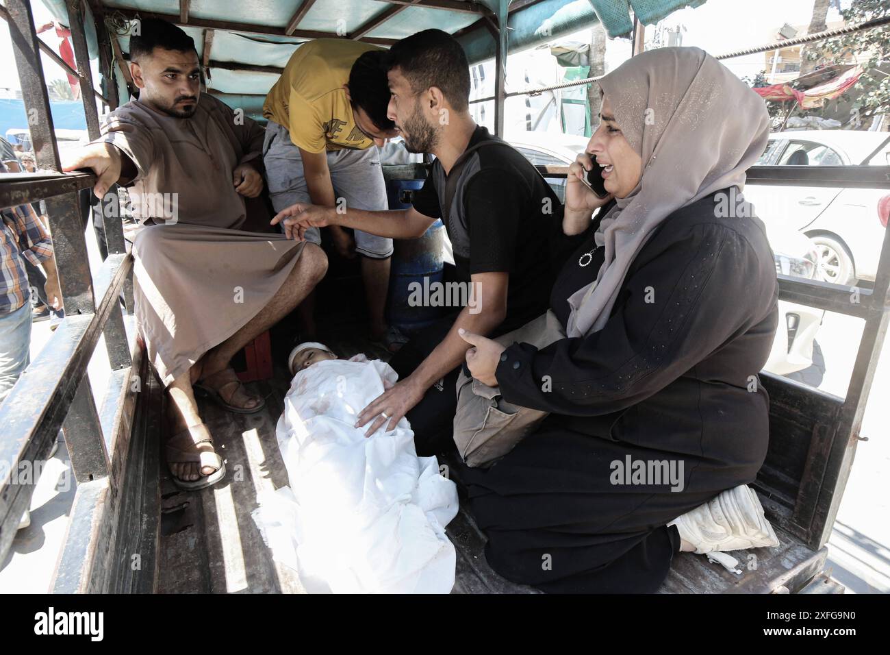The father and mother of Palestinian girl Hour Sami Daoud Abu Al-Rous ...