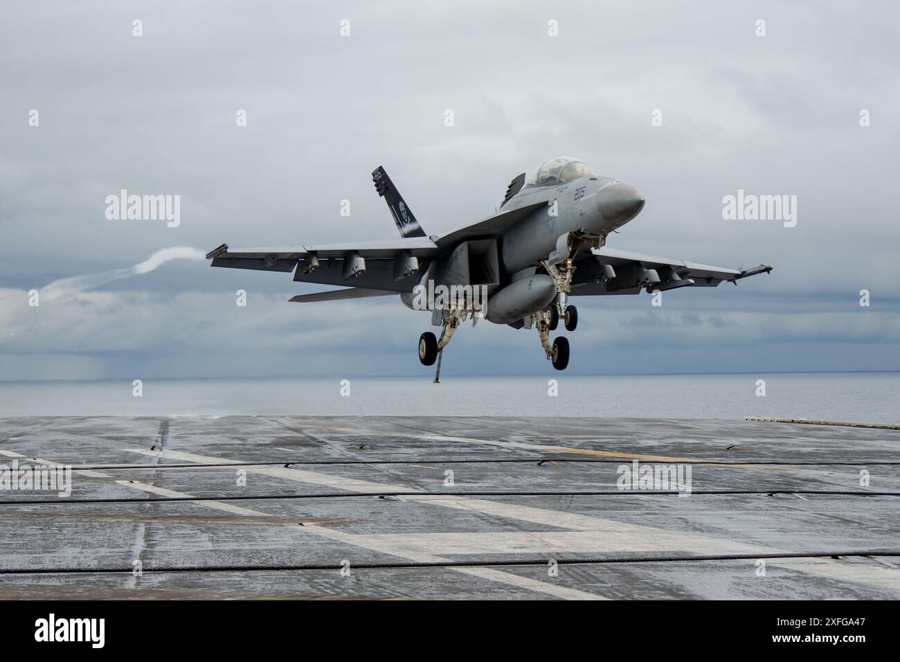 An F/A-18F Super Hornet, attached to Strike Fighter Squadron (VFA) 103 ...