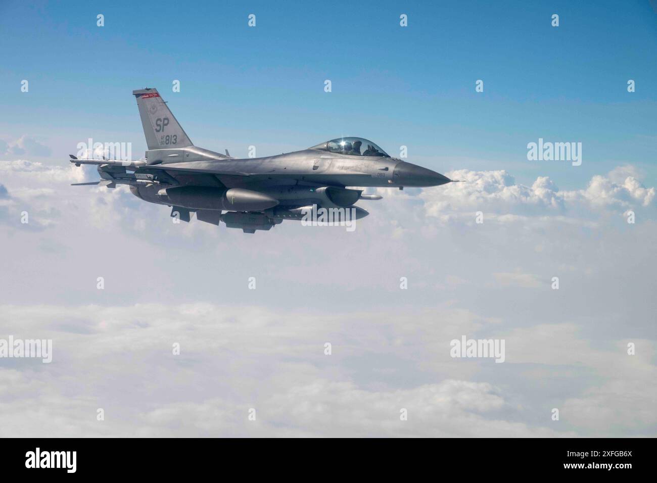 U.S. Air Force F-16 Fighting Falcon fighter flies over Germany, June 28 ...