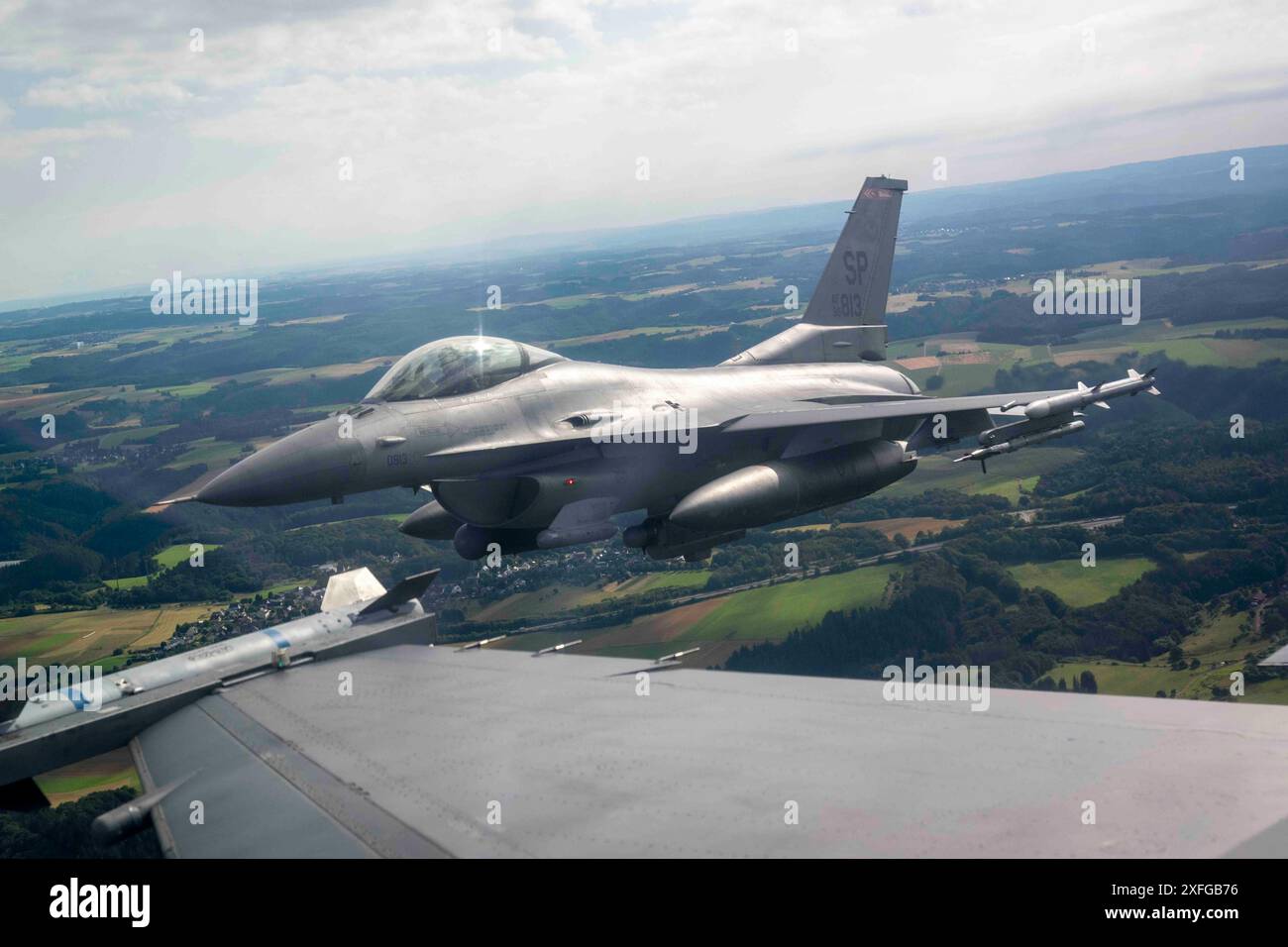 U.S. Air Force F-16 Fighting Falcon fighter flies over Germany, June 28 ...