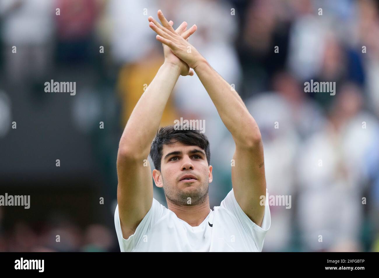 Carlos Alcaraz of Spain celebrates after defeating Aleksandar Vukic of ...