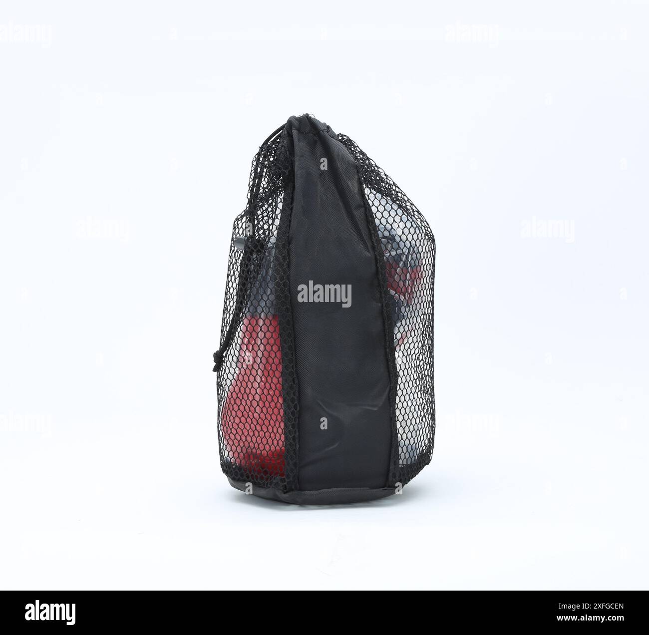 black mesh packing hand bag isolated Stock Photo - Alamy