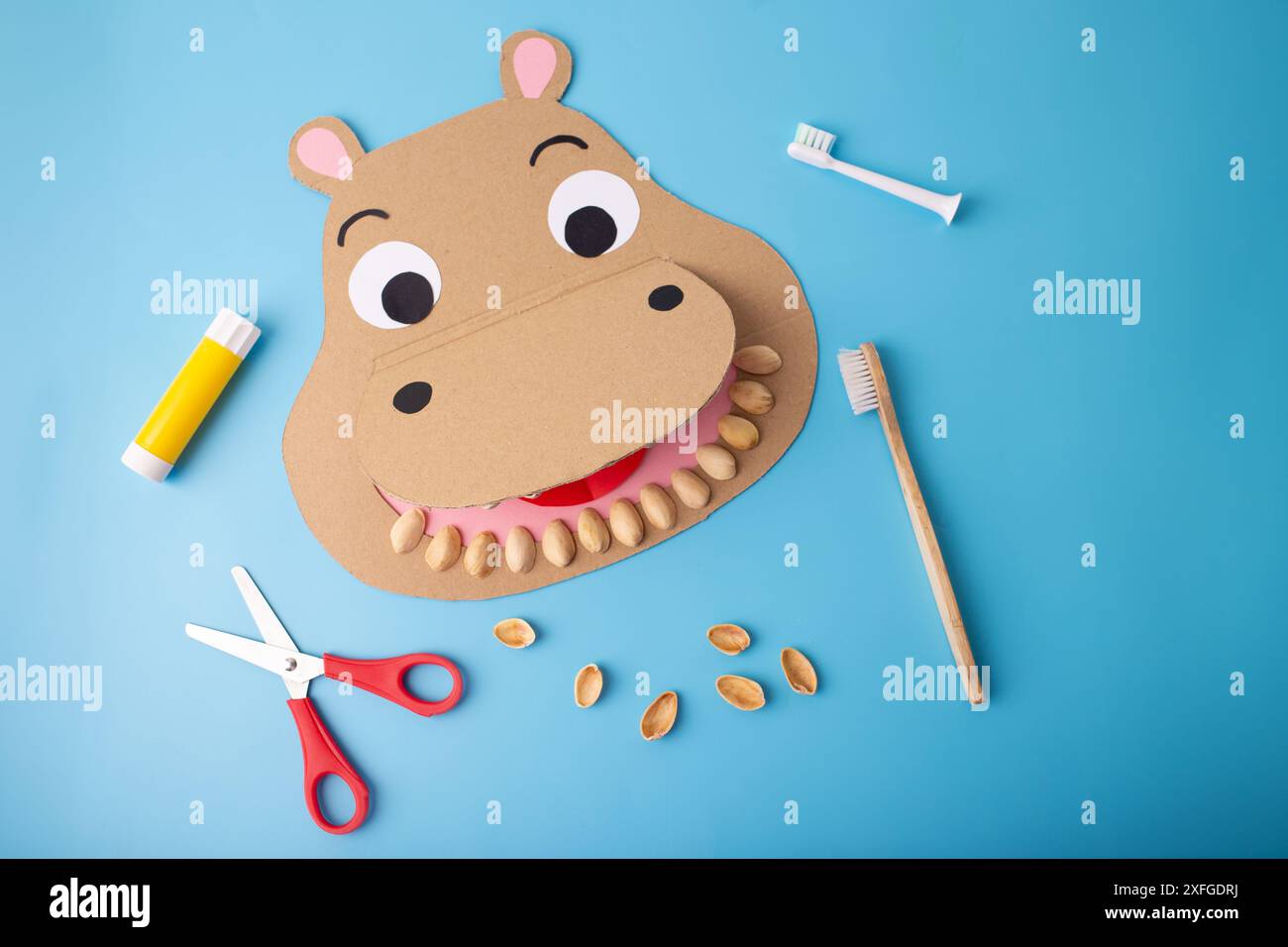 Creative paper craft shaped like a hippo with a toothbrush puppet ...