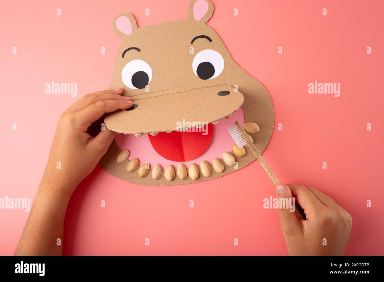 Handcrafted paper hippo with toothbrush puppet, designed for kids ...