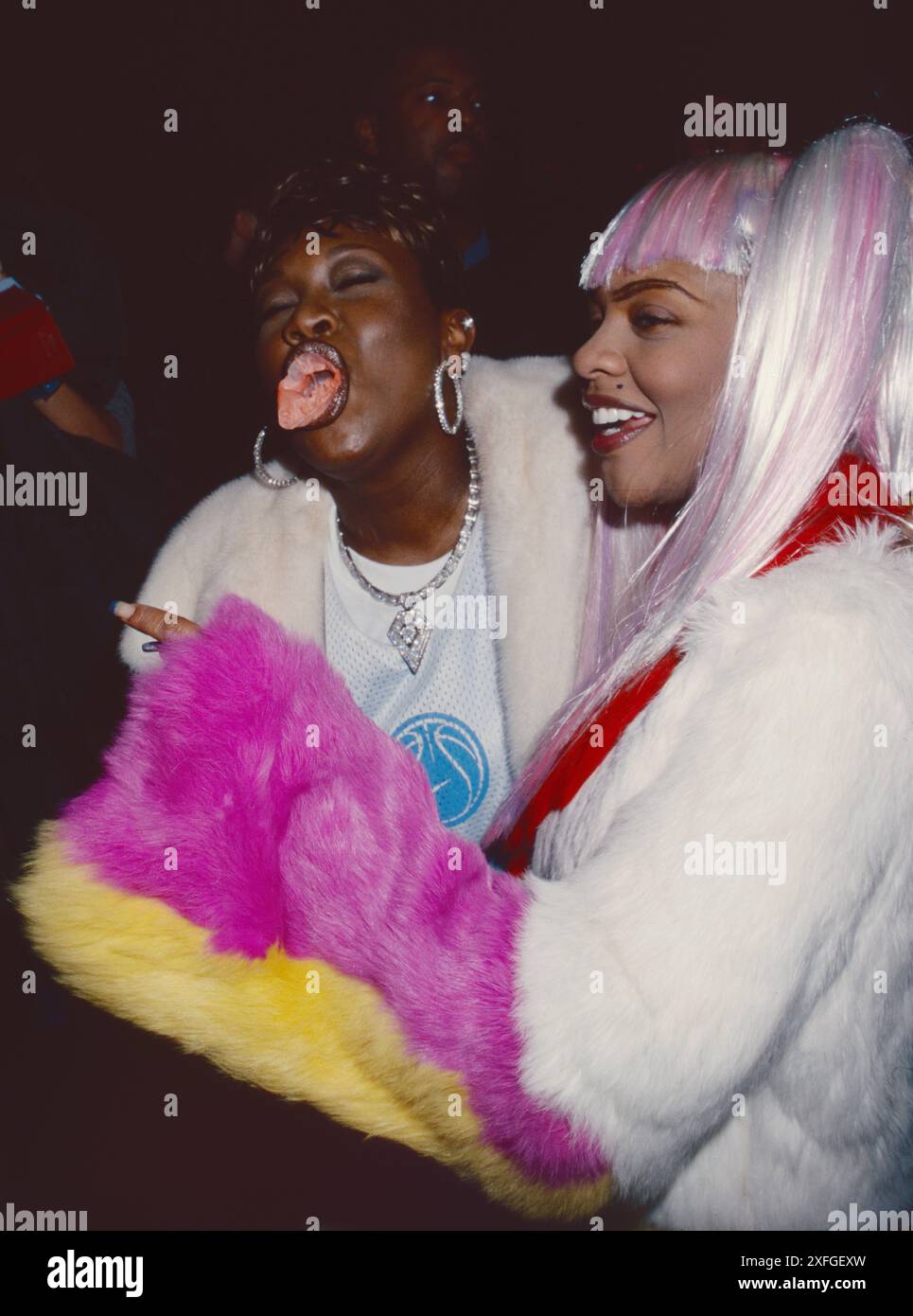 Missy Elliott and Lil' Kim attend the Sean Jean Fall 2000 Menswear ...