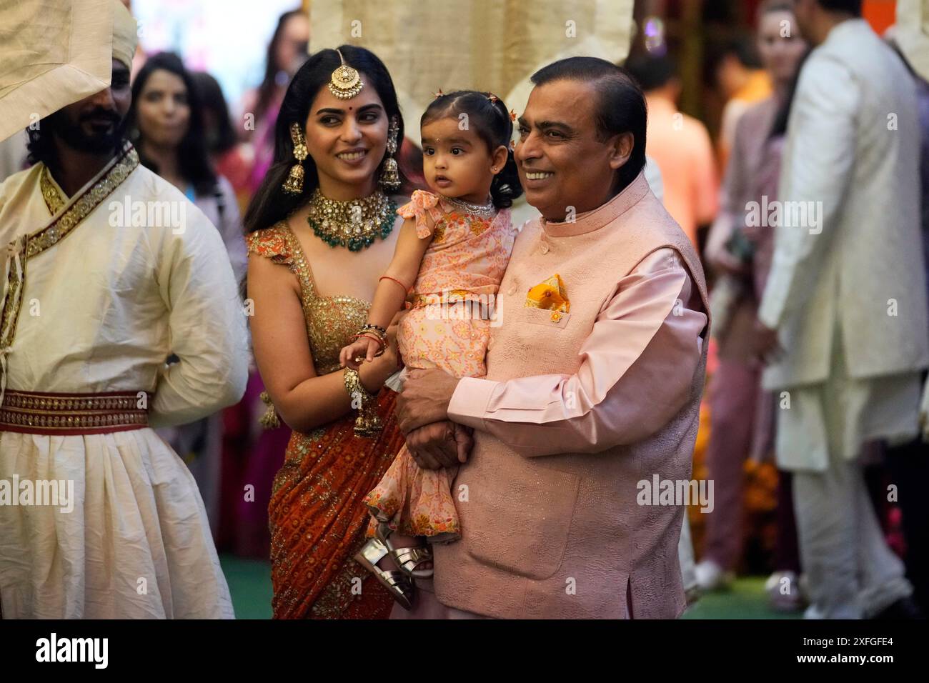Chairman of Reliance Industries Limited Mukesh Ambani, right, along ...