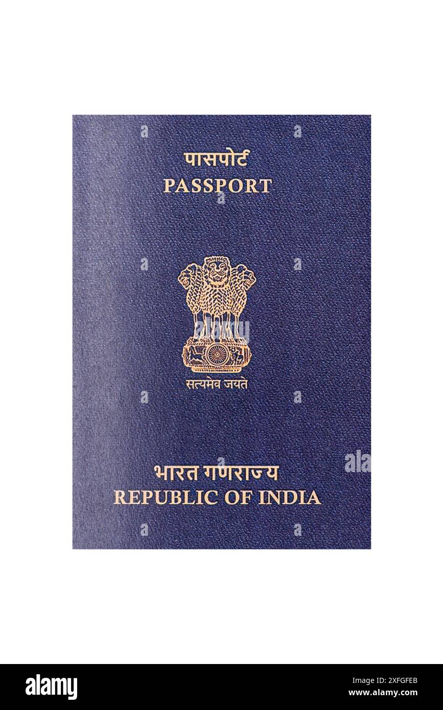 Physical paper international passport of Indian citizen on dark ...