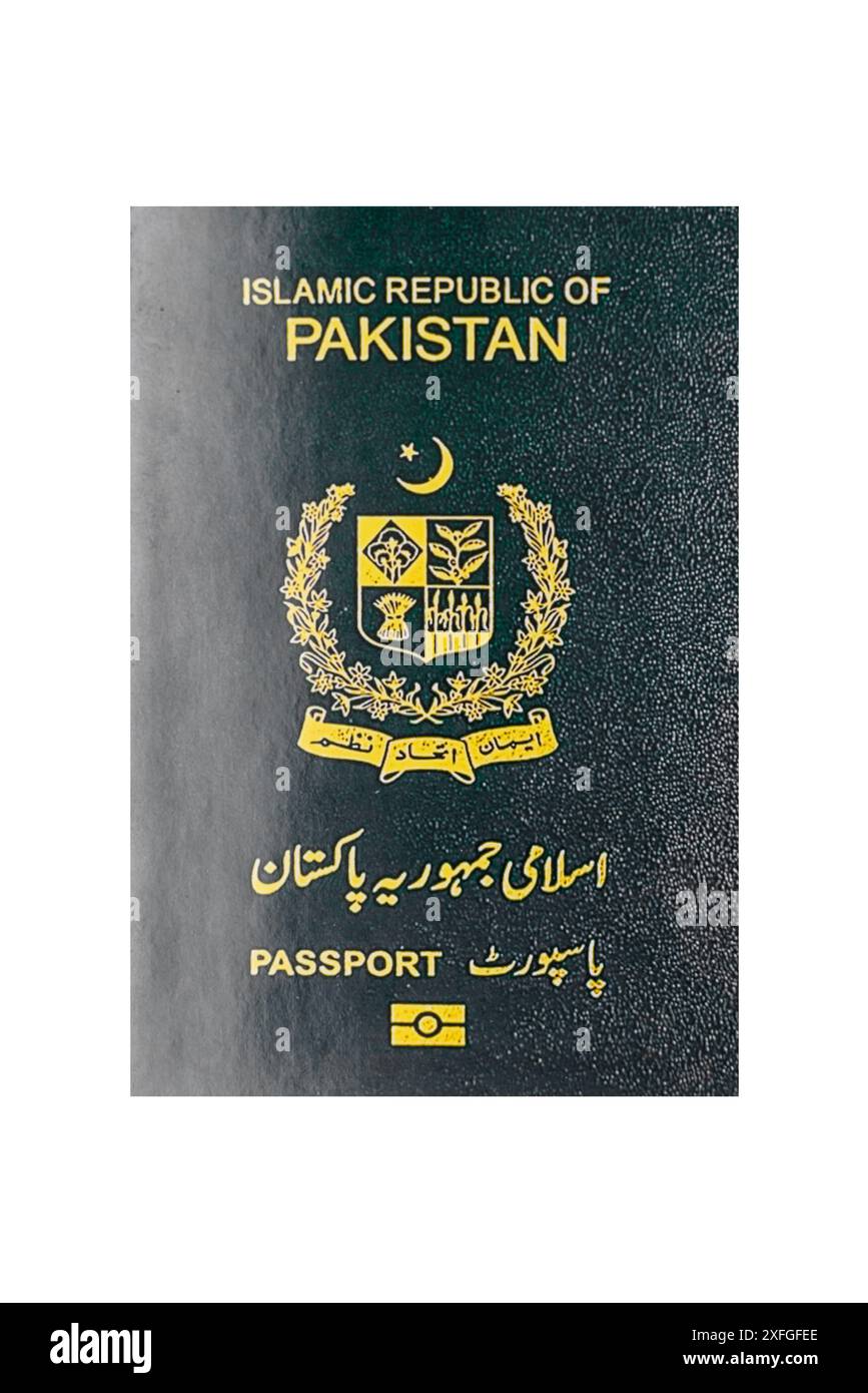 Physical paper international passport of Pakistani citizen on dark ...