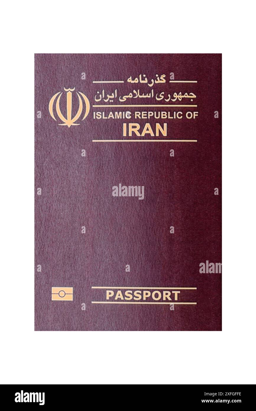 Physical paper international passport of Iranian citizen on dark ...