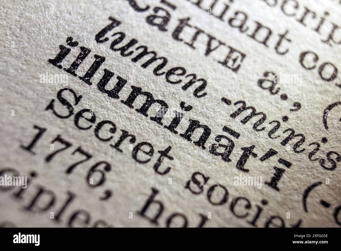 Word illuminati on dictionary page, macro close-up Stock Photo - Alamy