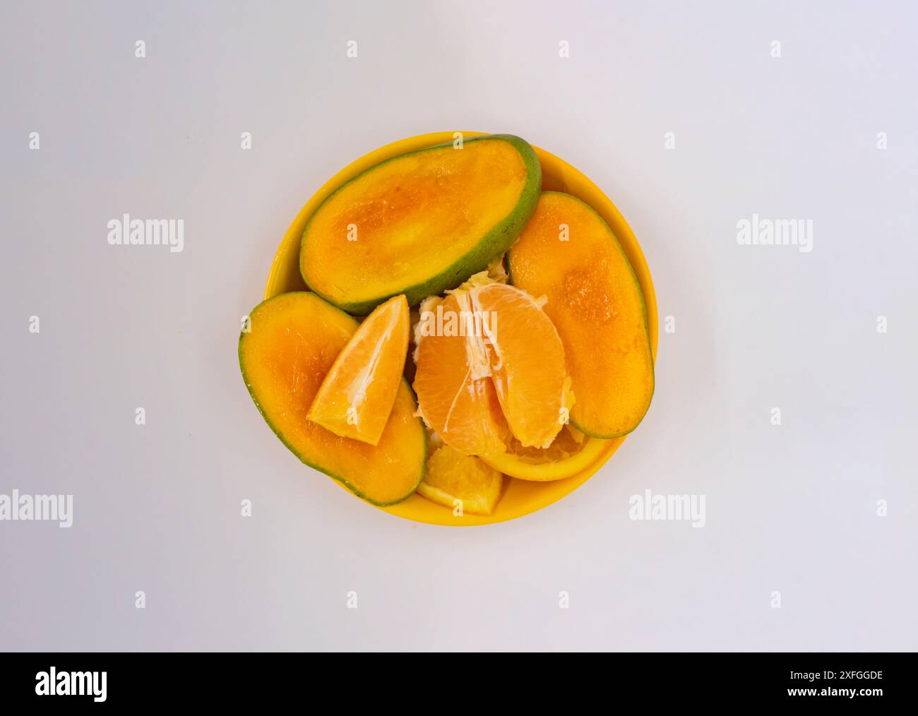 Mango half cut in cubes hi-res stock photography and images - Alamy