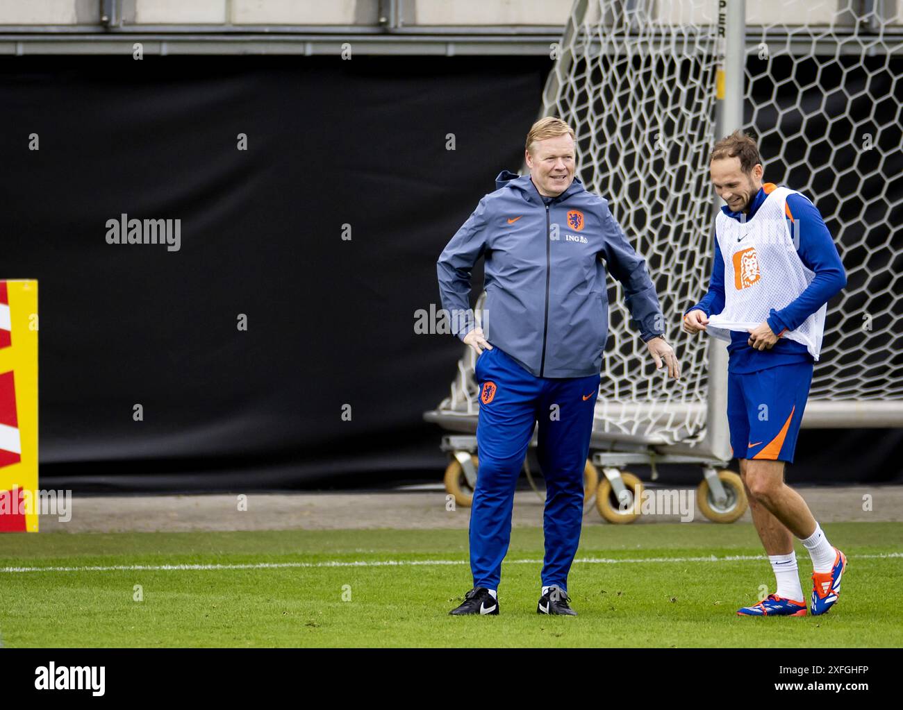 WOLFSBURG - National coach Ronald Koeman and Daley Blind during a ...