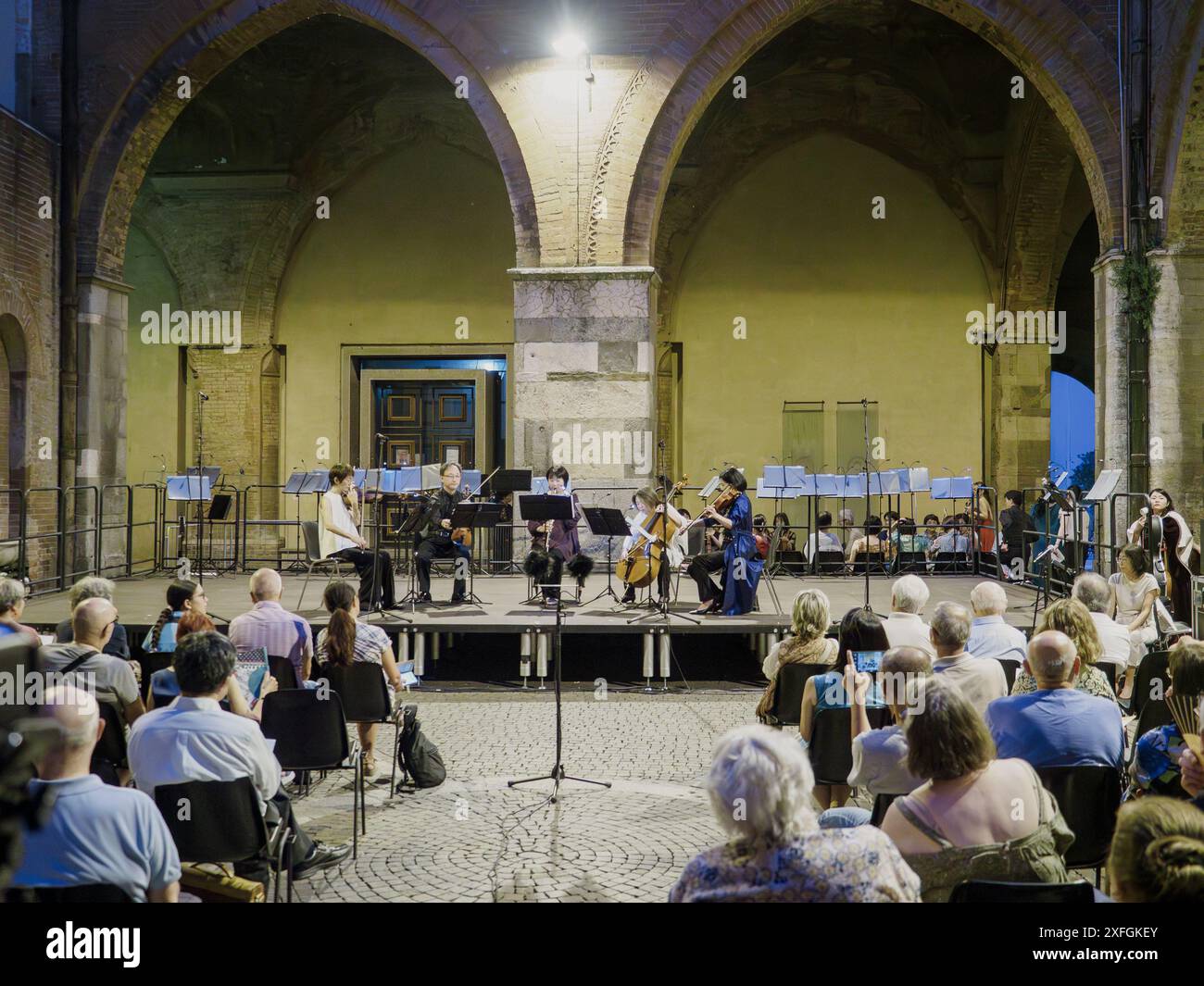 String quartet instruments on chairs hi-res stock photography and ...