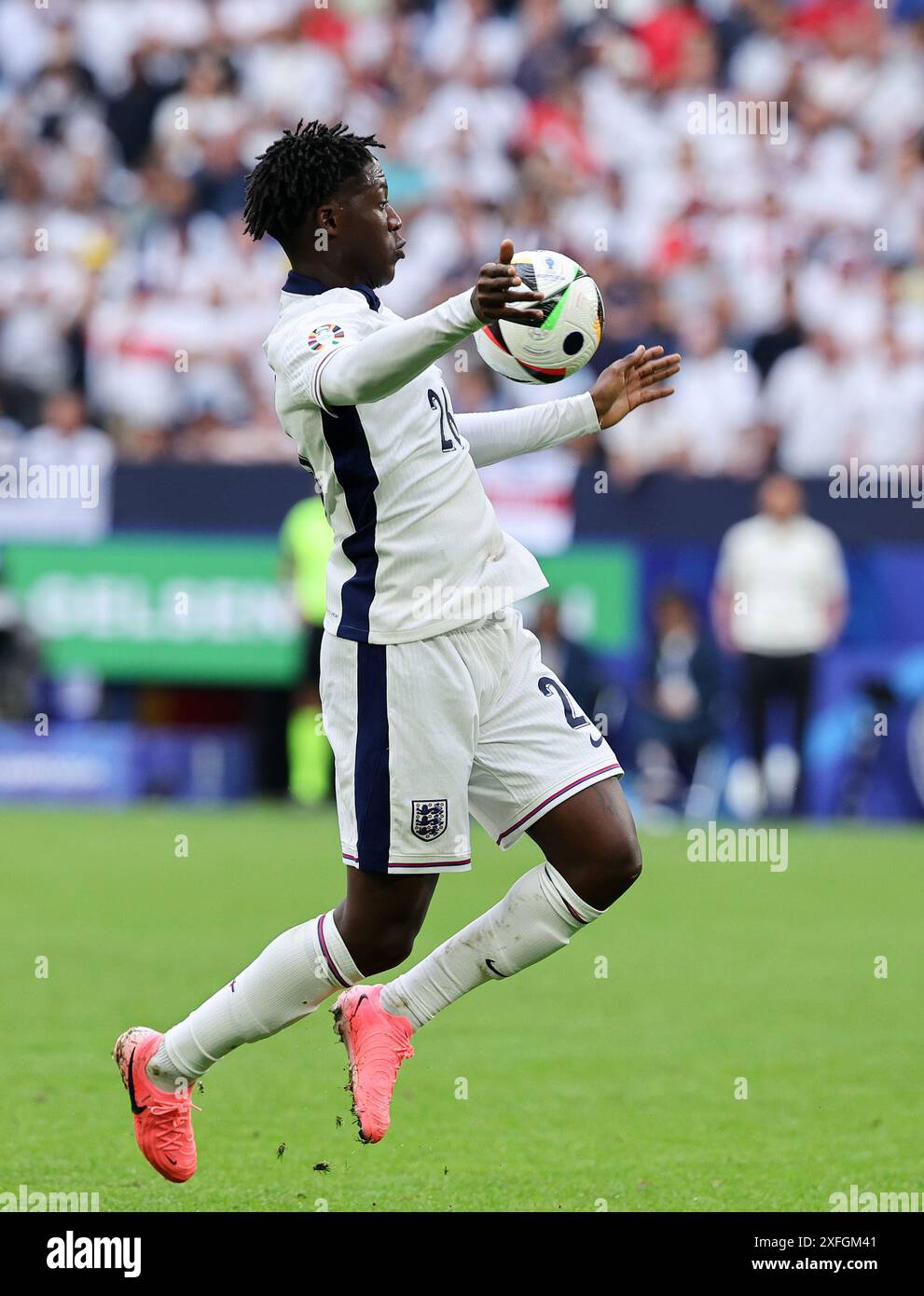 GELSENKIRCHEN, GERMANY - JUNE 30: Kobbie Mainoo of England runs with a ...