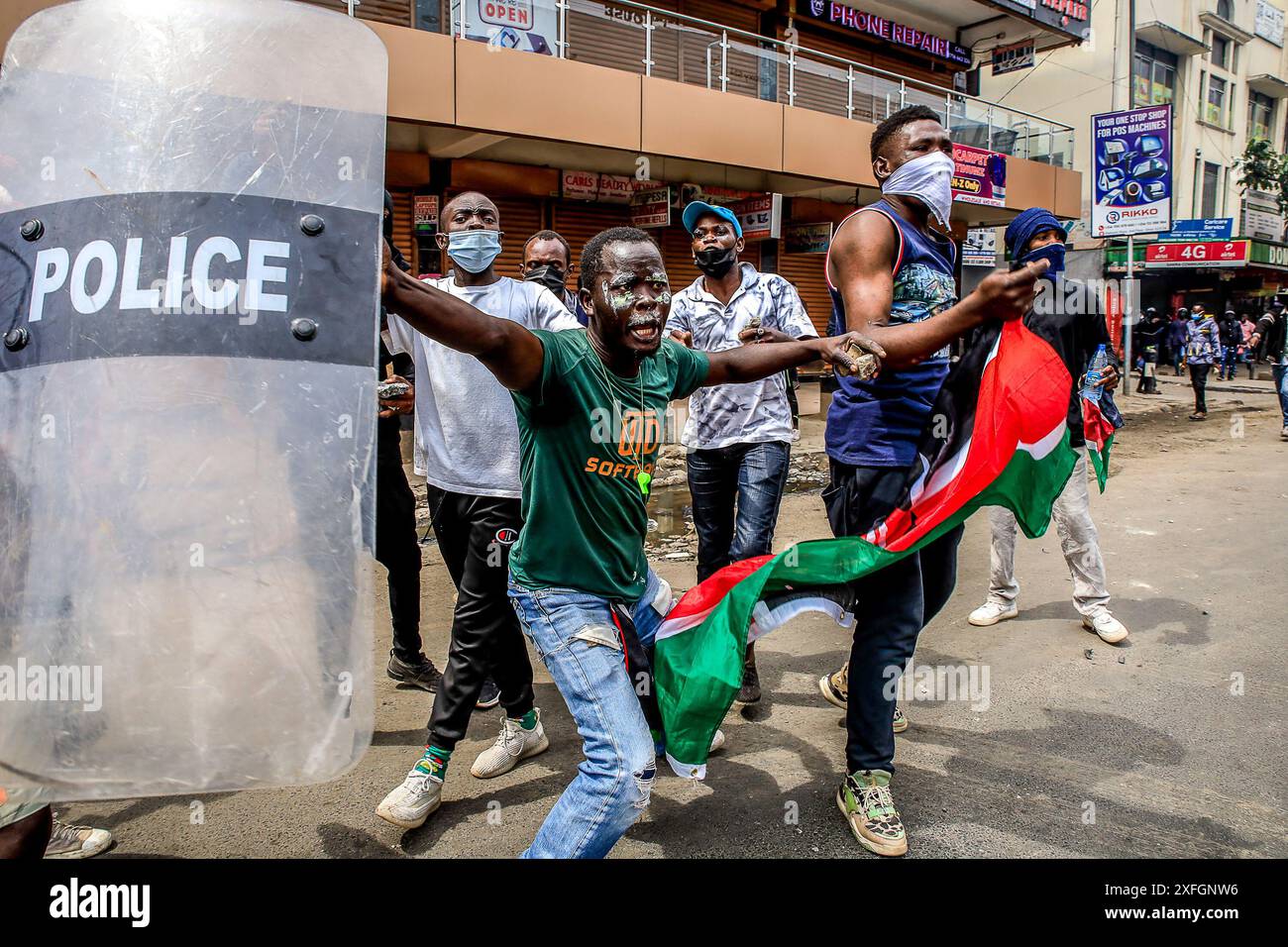 Nairobi, Kenya. 2nd July, 2024. Angry protesters carrying a police ...