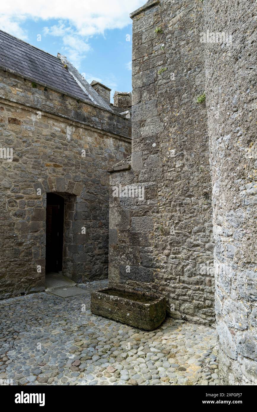 Cahir castle sits on a small rocky island in the middle of the River ...