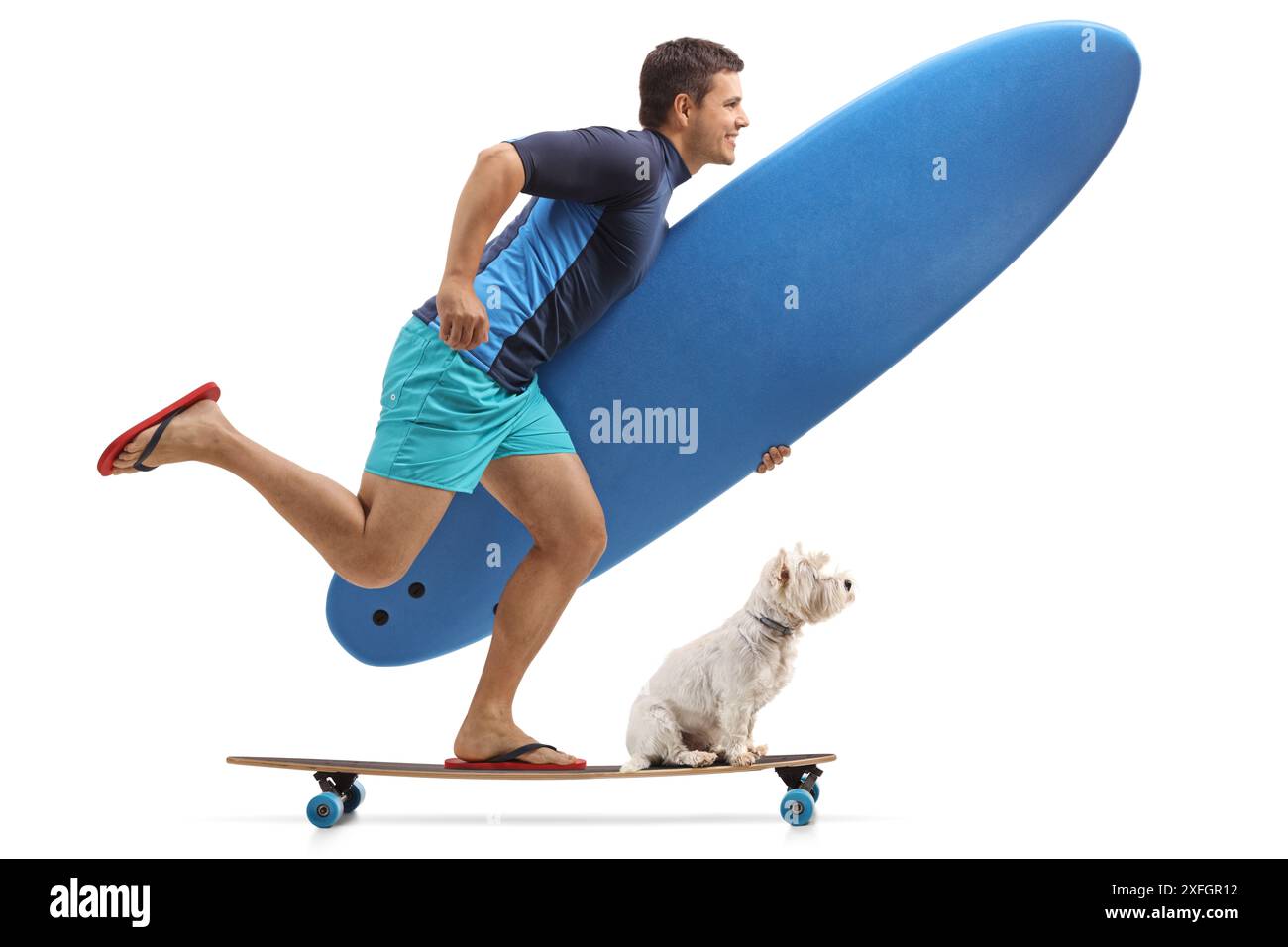 Full length profile shot of a man with a surfboard riding a longboard ...