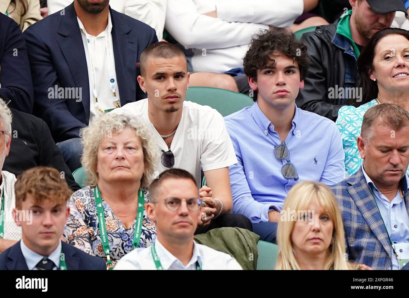 Romeo Beckham watching Emma Raducanu vs Elise Mertens on court number ...