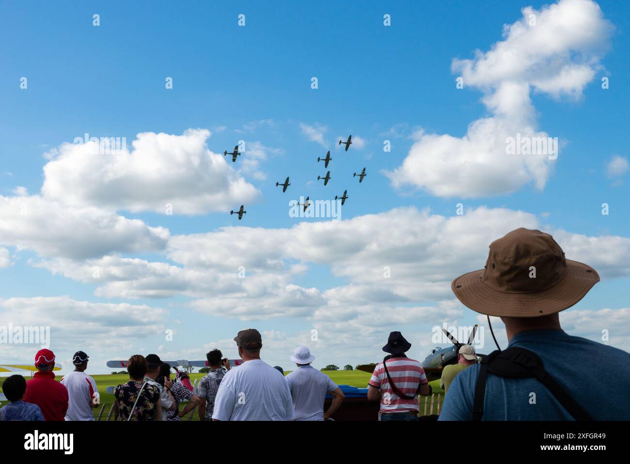 Airshow audience watching a formation of Second World War Supermarine ...