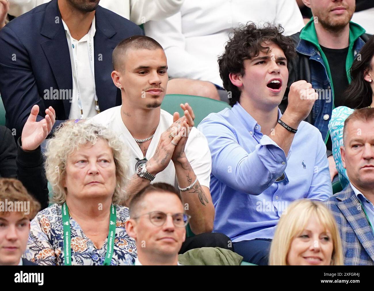 Romeo Beckham watching Emma Raducanu vs Elise Mertens on court number ...
