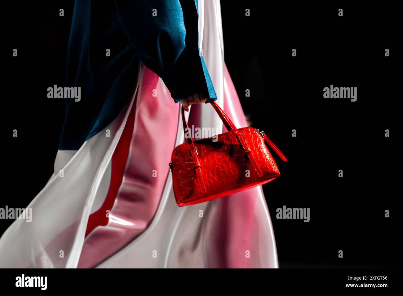 Long red satin dress hi-res stock photography and images - Alamy