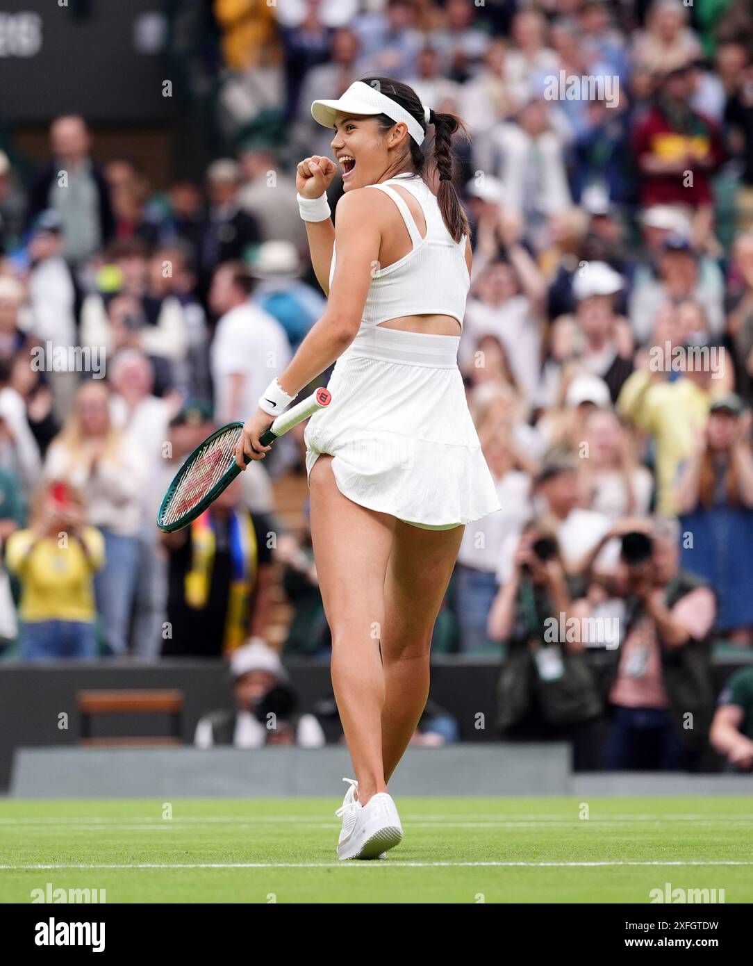 Emma Raducanu celebrates victory over Elise Mertens on day three of the ...