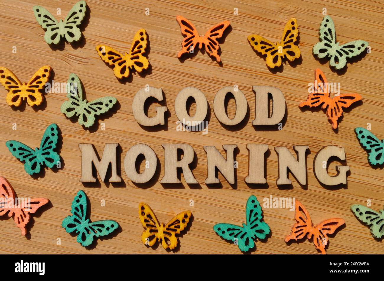 Good Morning, words in wooden alphabet letters surrounded by ...