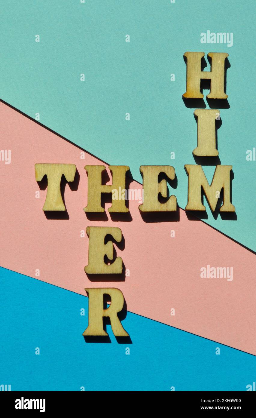 Him, Her, Them, gender pronoun, words in wooden alphabet letters ...