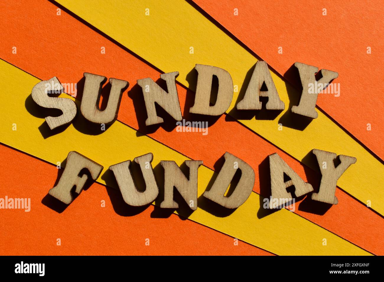 Sunday Funday, phrase in wooden alphabet letters isolated on bright ...