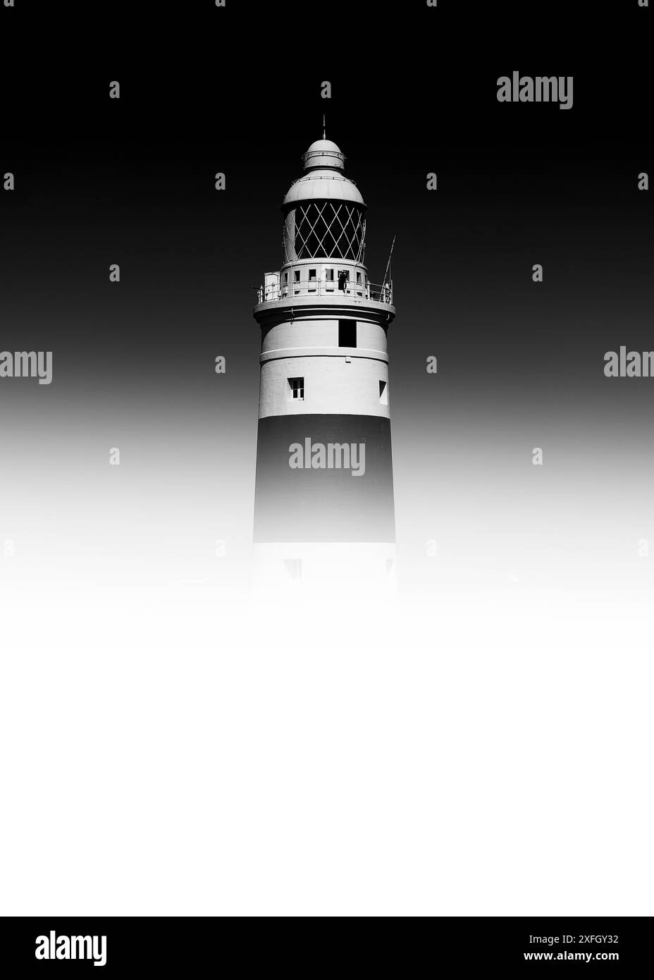 A grayscale of a lighthouse emerging from a gradient background Stock ...