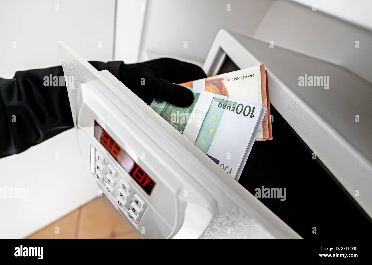Thief breaking into safe hi-res stock photography and images - Alamy
