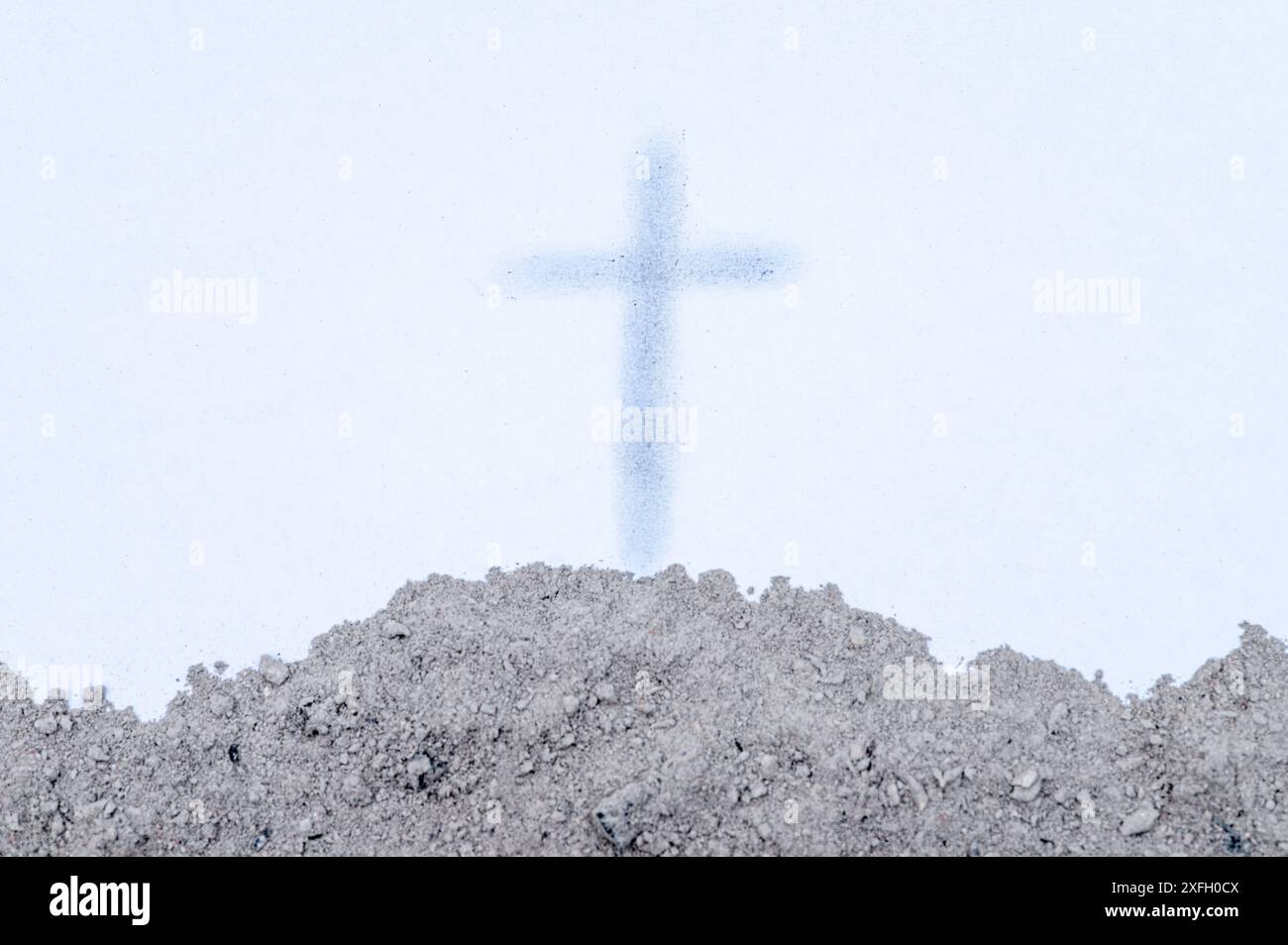 Golgotha hill with cross of Jesus Christ drawing made in ash, sand or ...