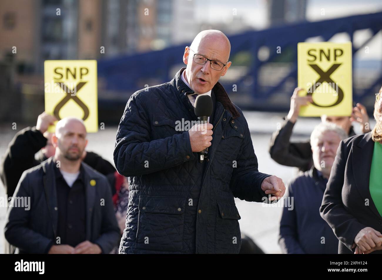 Scottish First Minister and SNP leader John Swinney giving a speech in ...